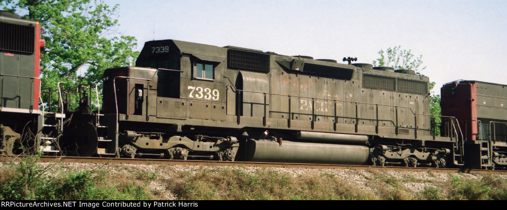 SP 7339 SD40R on an eastbound intermodal train by Dahlia Walk at NE Tower on CSX in New Orleans ...